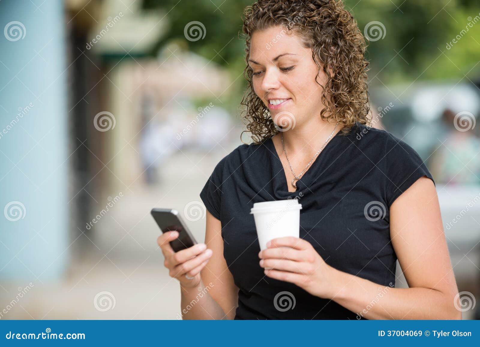 Woman with Coffee Cup Messaging through Smartphone Stock Image - Image ...