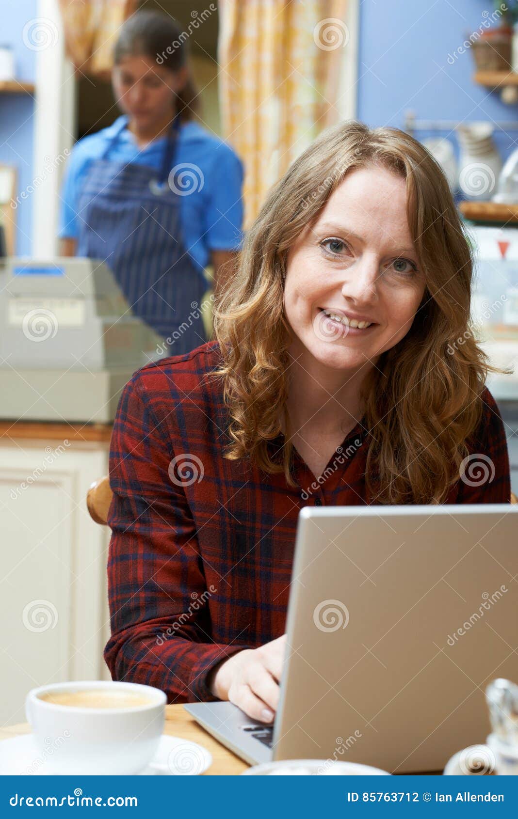 Woman in Coffee Shop Using Laptop Computer Stock Photo - Image of ...