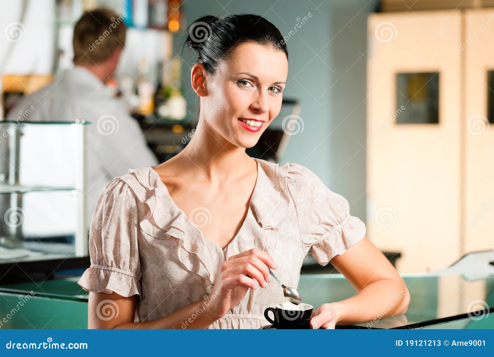 Woman in a coffeeshop stock image. Image of vivre, stirring - 19121213