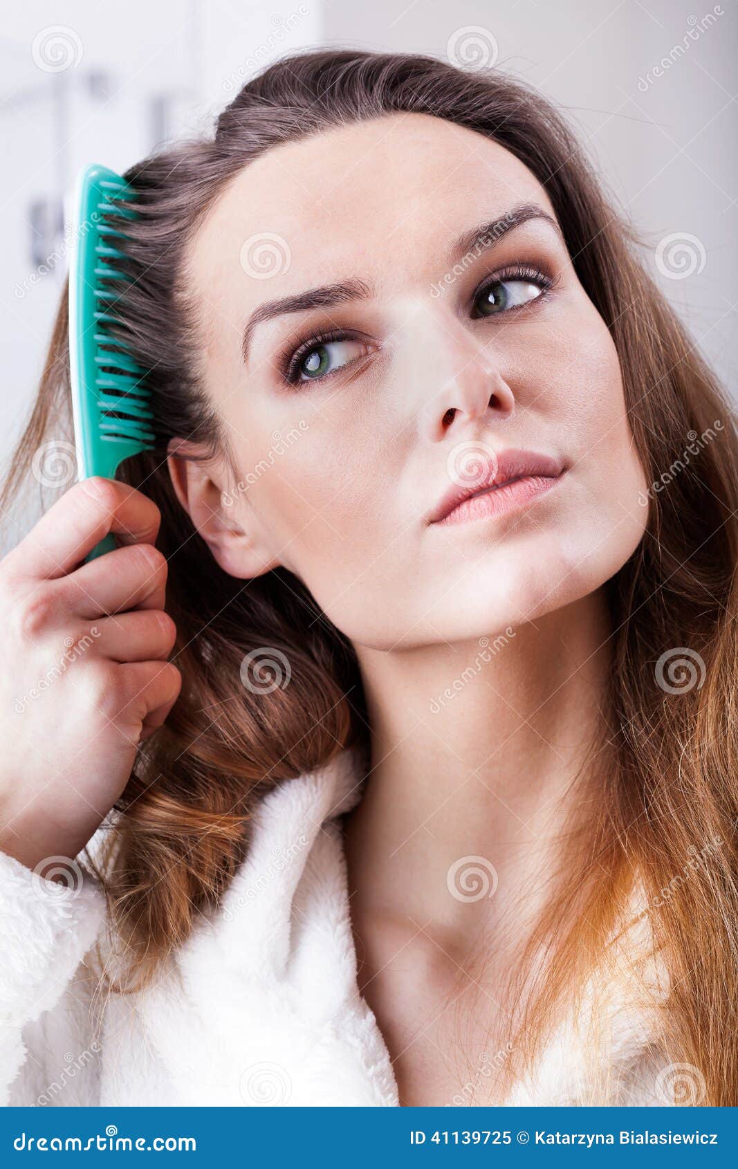 Combing Hair. Angry Woman Combing Her Long Unmanageable Unruly ...
