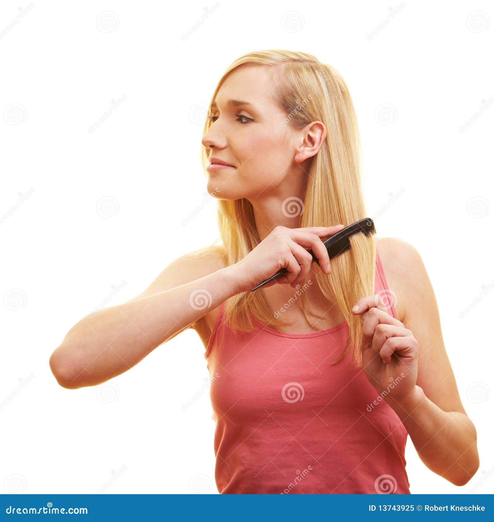 Woman combing her hair stock image. Image of enjoyment - 13743925