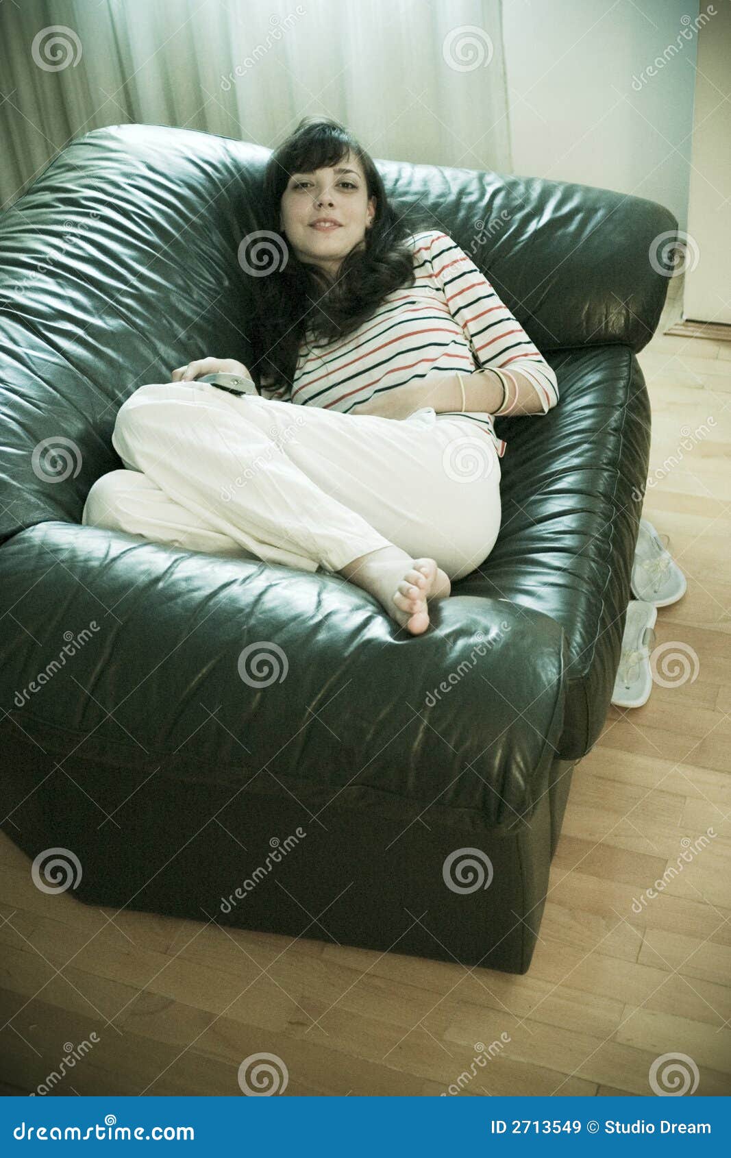Woman comfy on sofa stock image. Image of happy, peaceful - 2713549