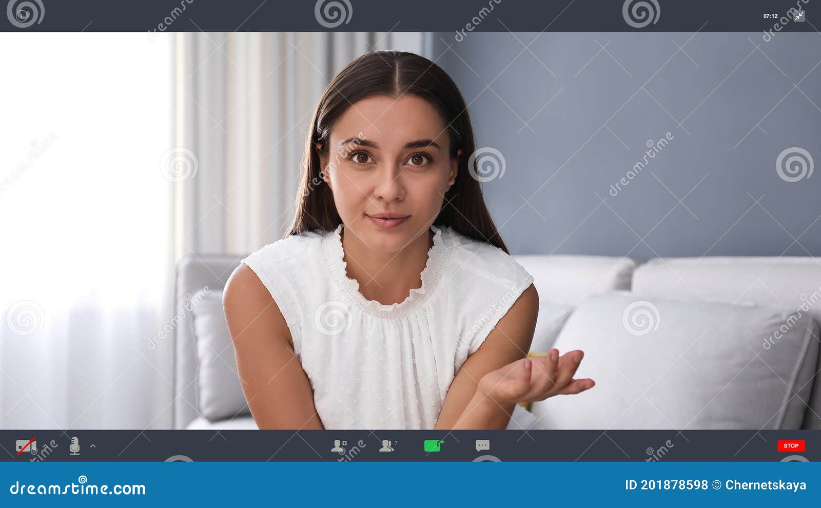 Woman Communicating with Coworkers from Home Using Video Chat, View ...