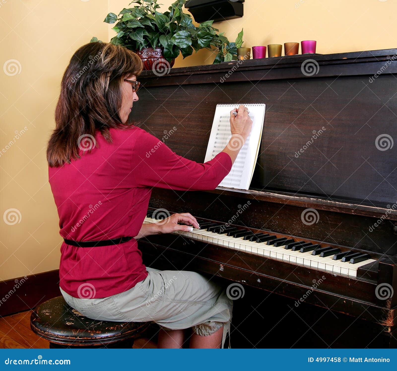 Woman Composing Piano Music Stock Photo - Image of note, artist: 4997458