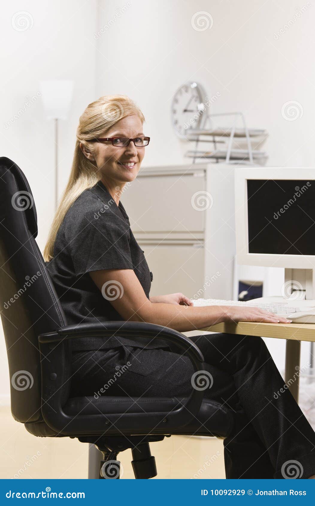 Woman on Computer stock image. Image of corporate, golden - 10092929