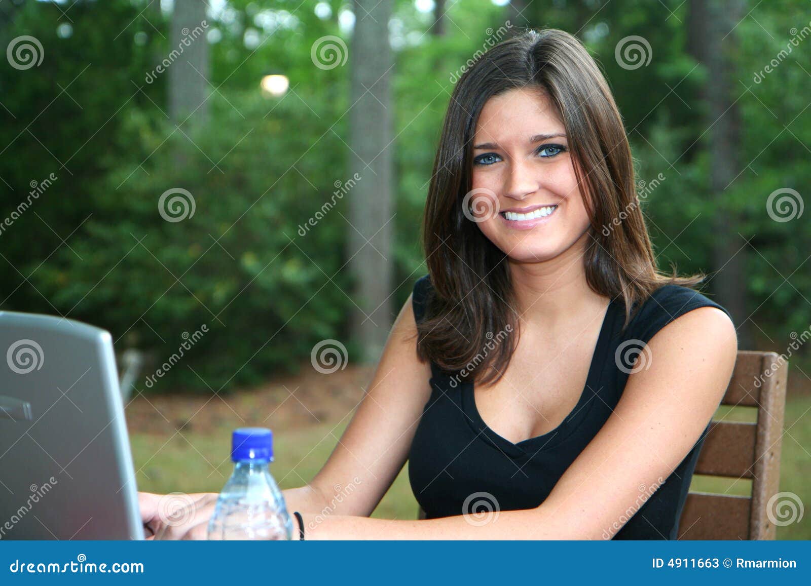 Woman on Computer stock image. Image of patio, college - 4911663