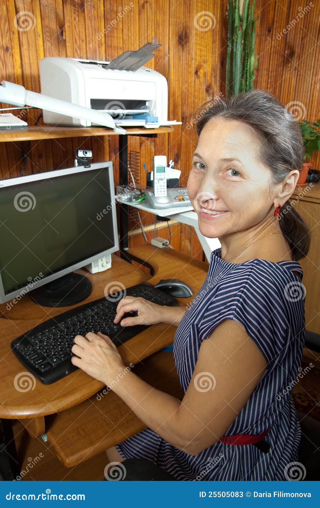 Woman at computer at home stock image. Image of life - 25505083