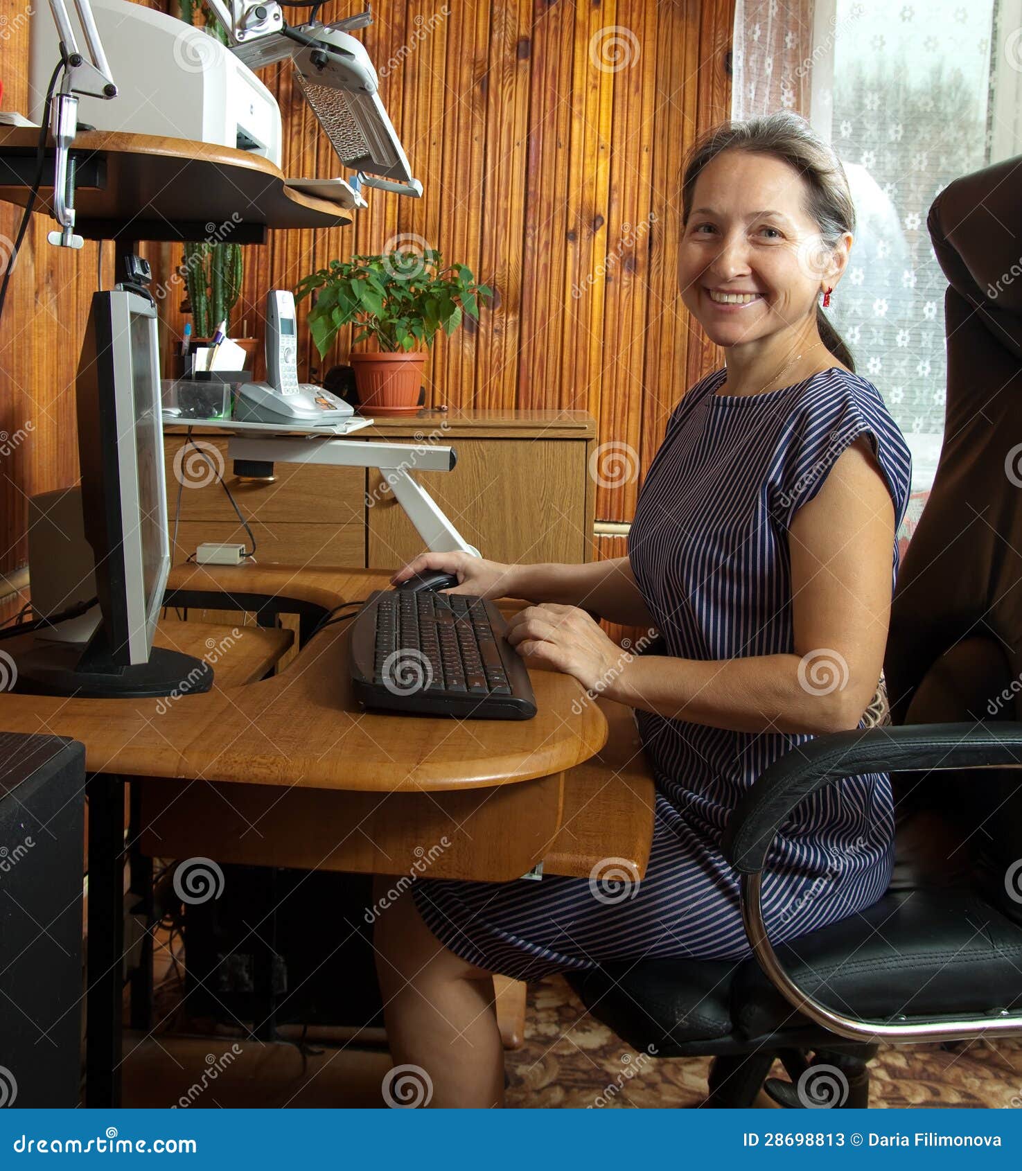Woman at computer at home stock image. Image of business - 28698813