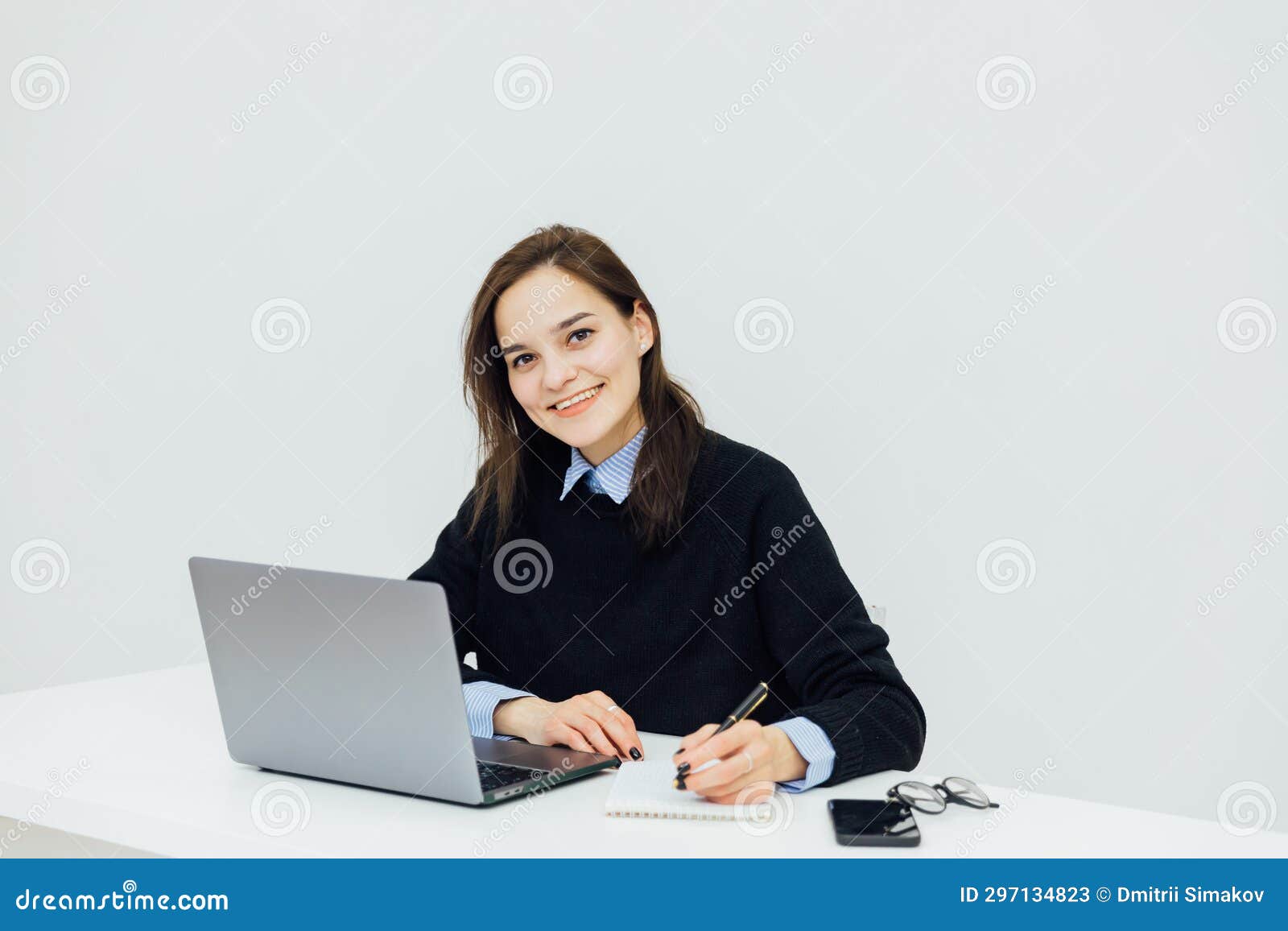 Woman at the Computer in the Office at a Remote Work Internet ...