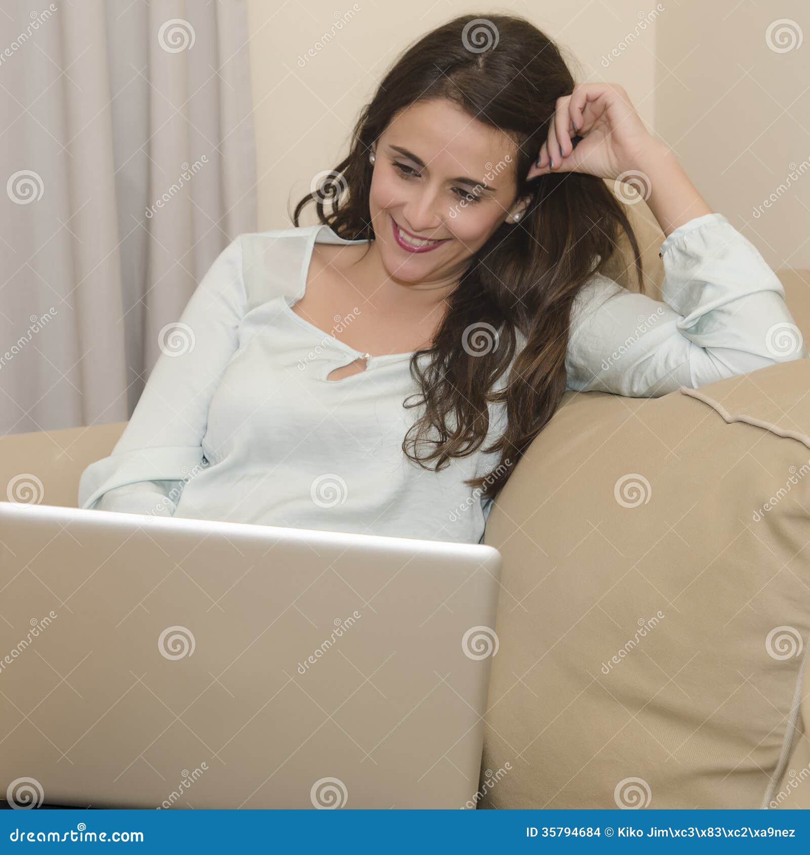 Woman with Computer and Smiling Stock Photo - Image of young, reading ...