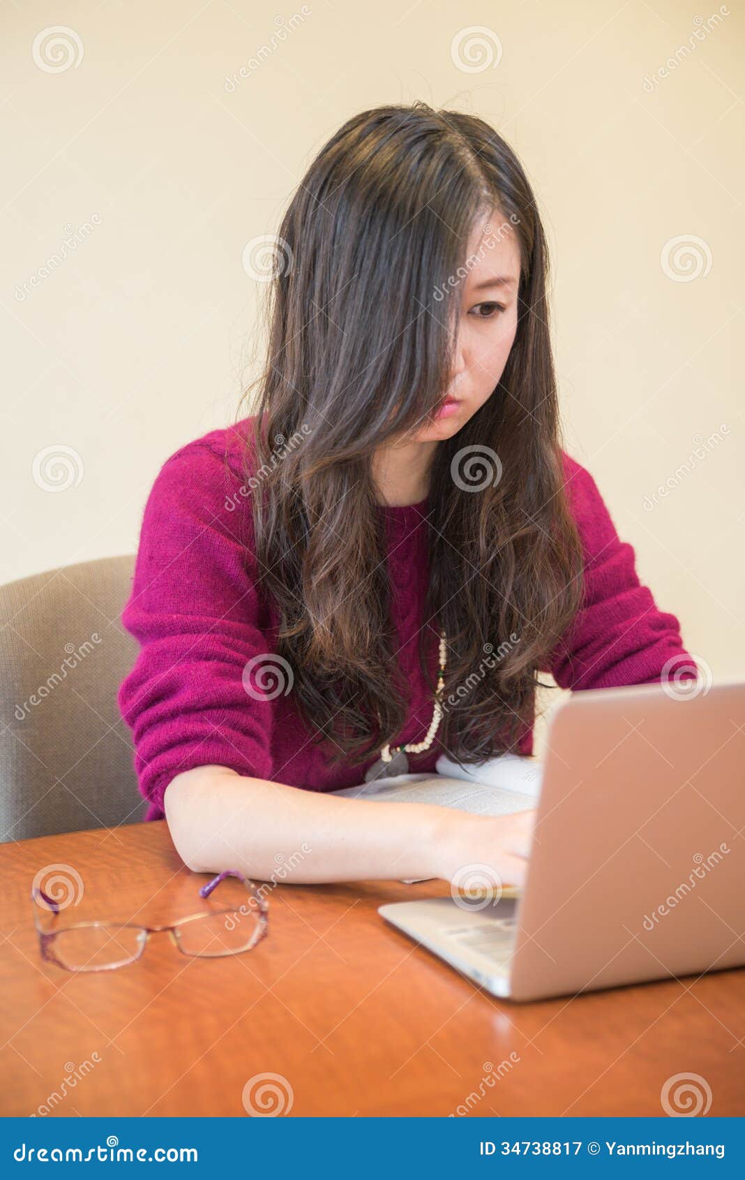 Woman on computer stock image. Image of culture, face - 34738817