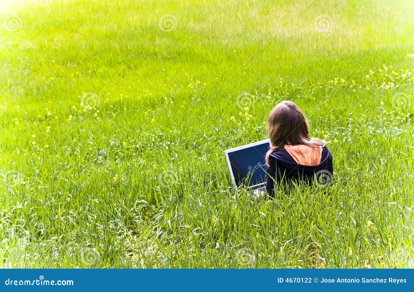 Woman Connected on the Grass Stock Photo - Image of outdoors, park: 4670122