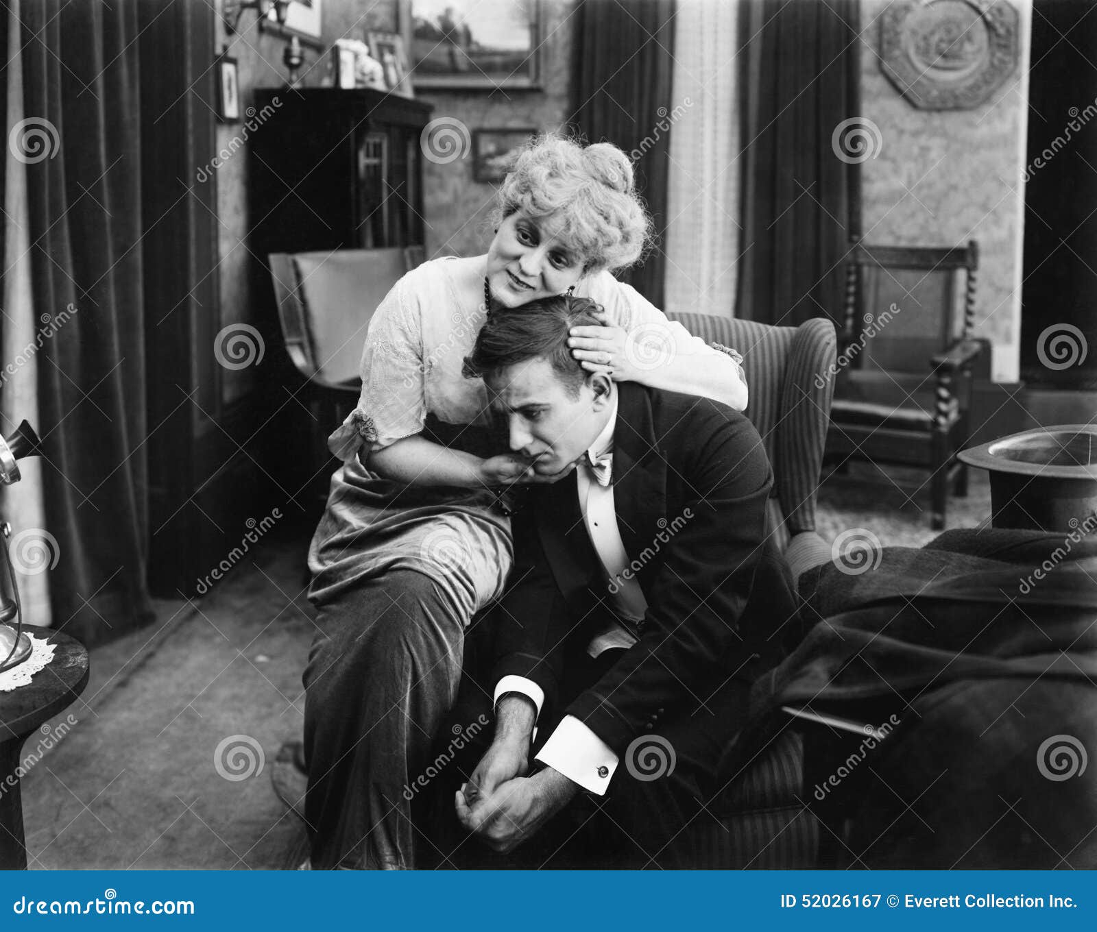 Woman Consoling A Crying Female Friend In Bed Stock Photography ...