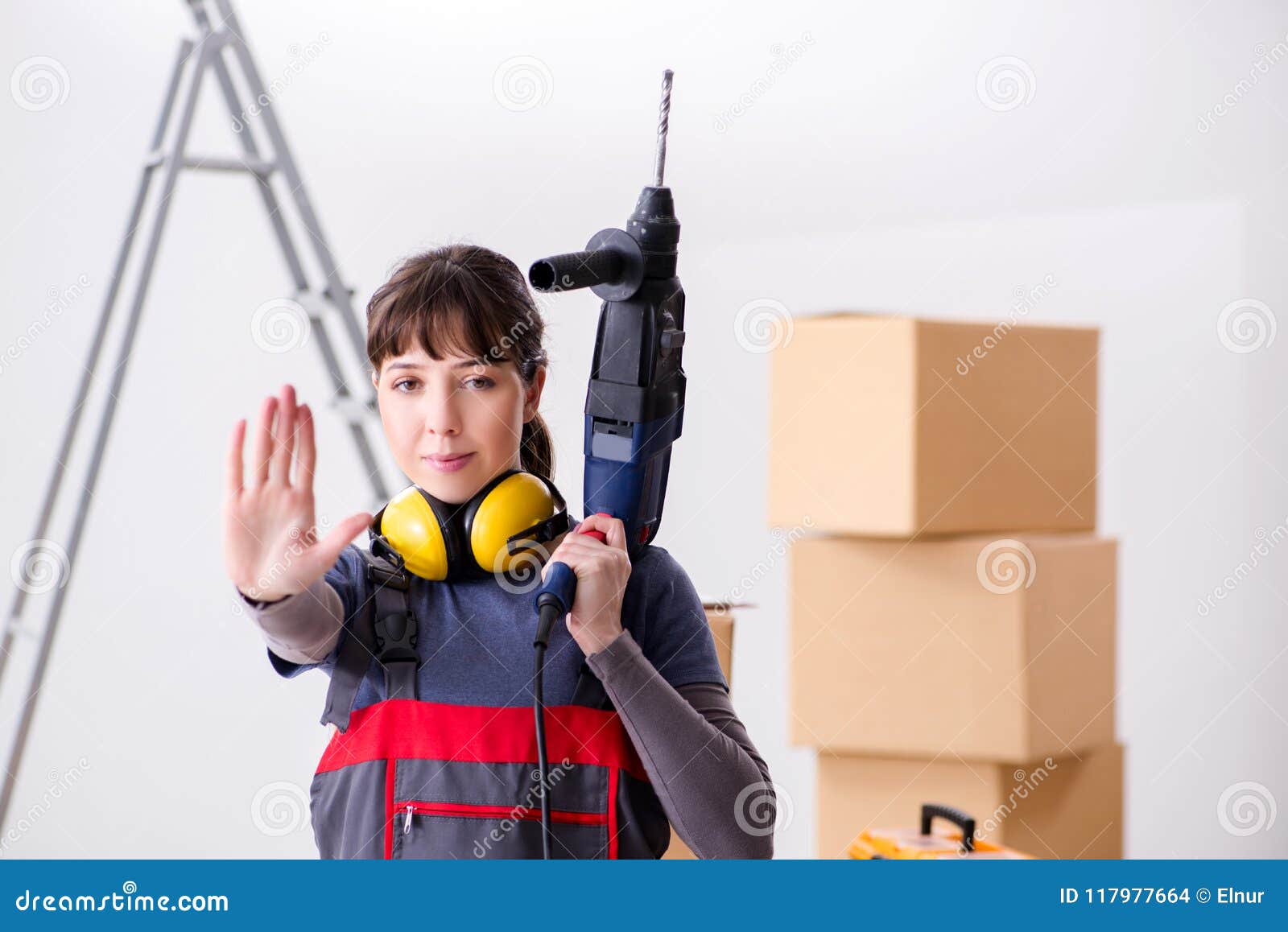 The Woman Contractor with Hand Drill at Construction Site Stock Photo ...