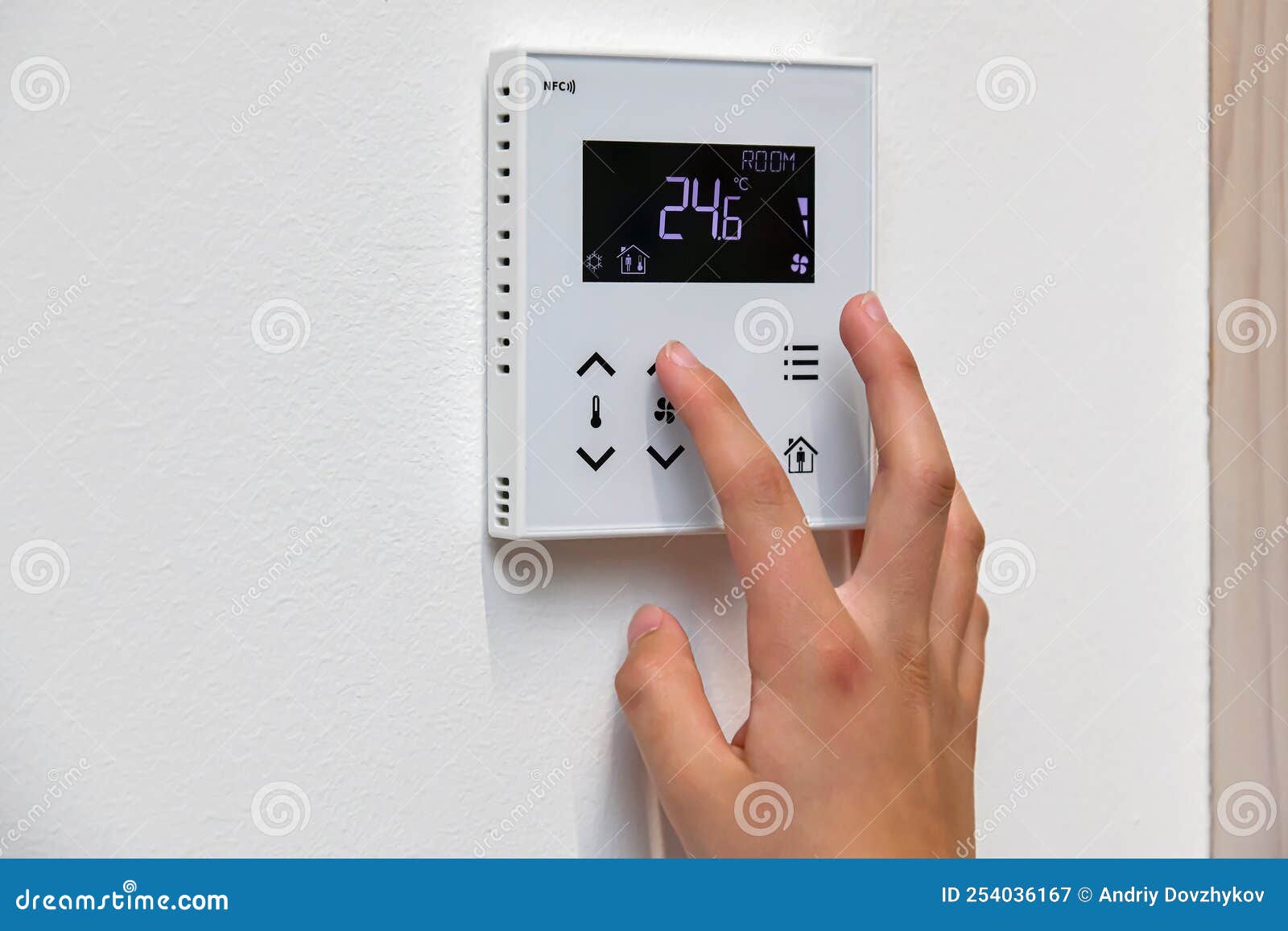 The Woman Controls the Temperature in the House. Air Conditioning and ...