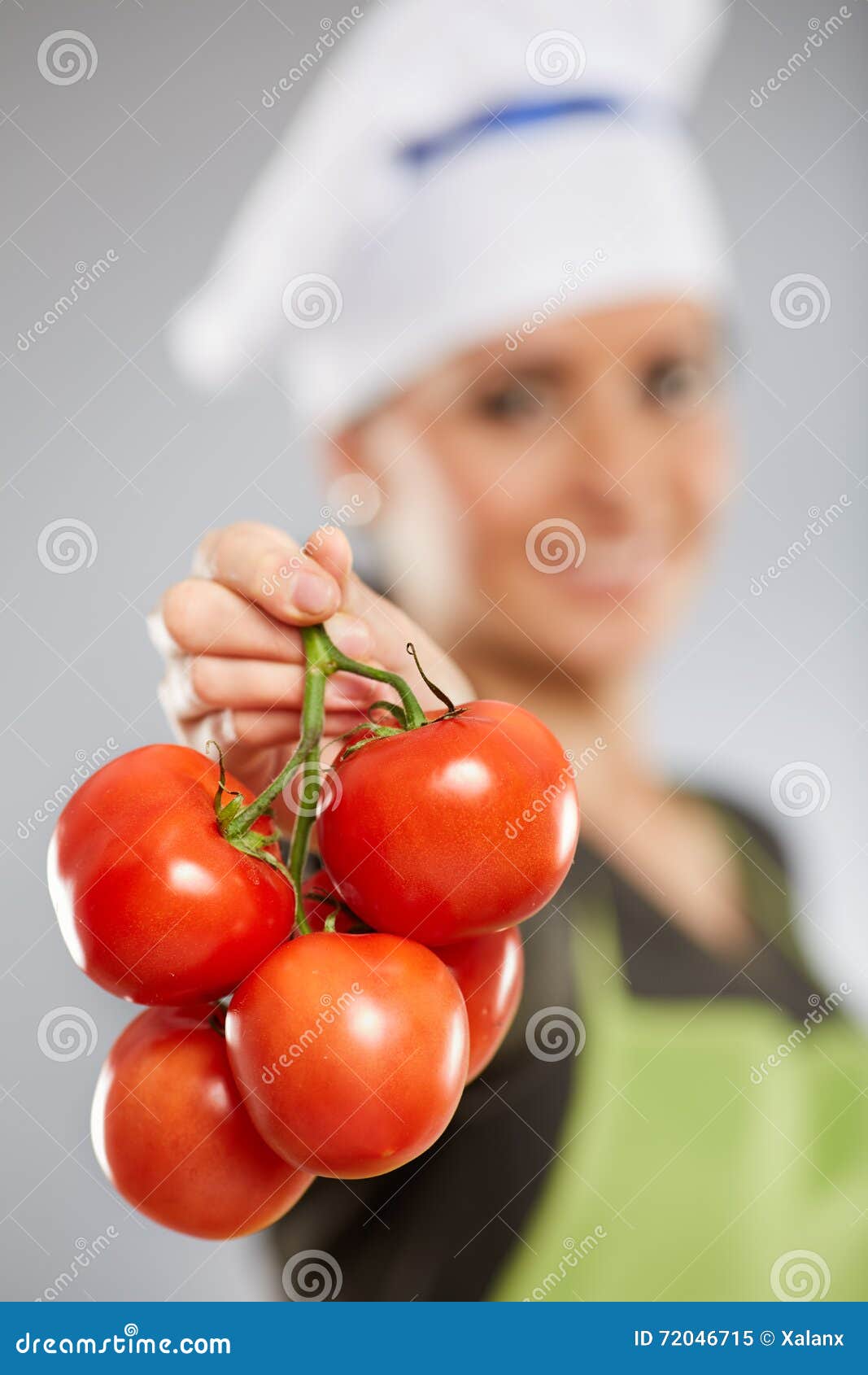 Woman cook with tomatoes stock image. Image of food, healthy - 72046715