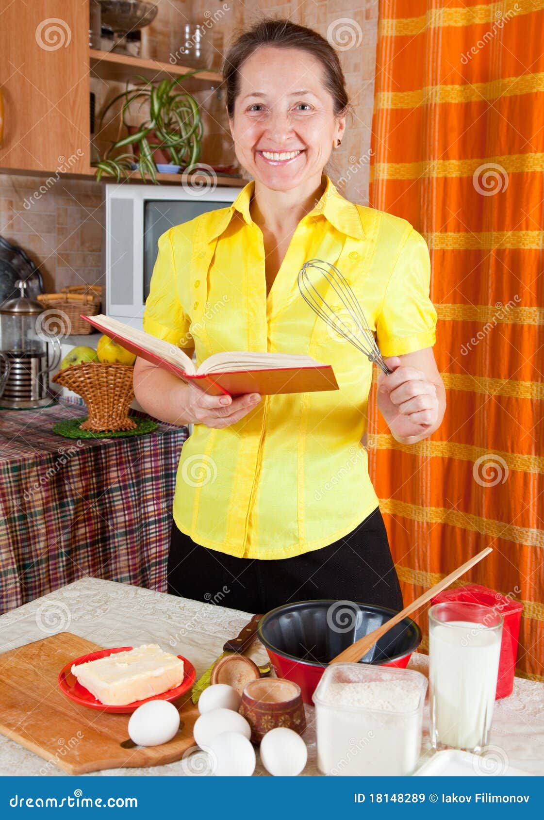 Woman with cookbook stock image. Image of scrambled, interior - 18148289
