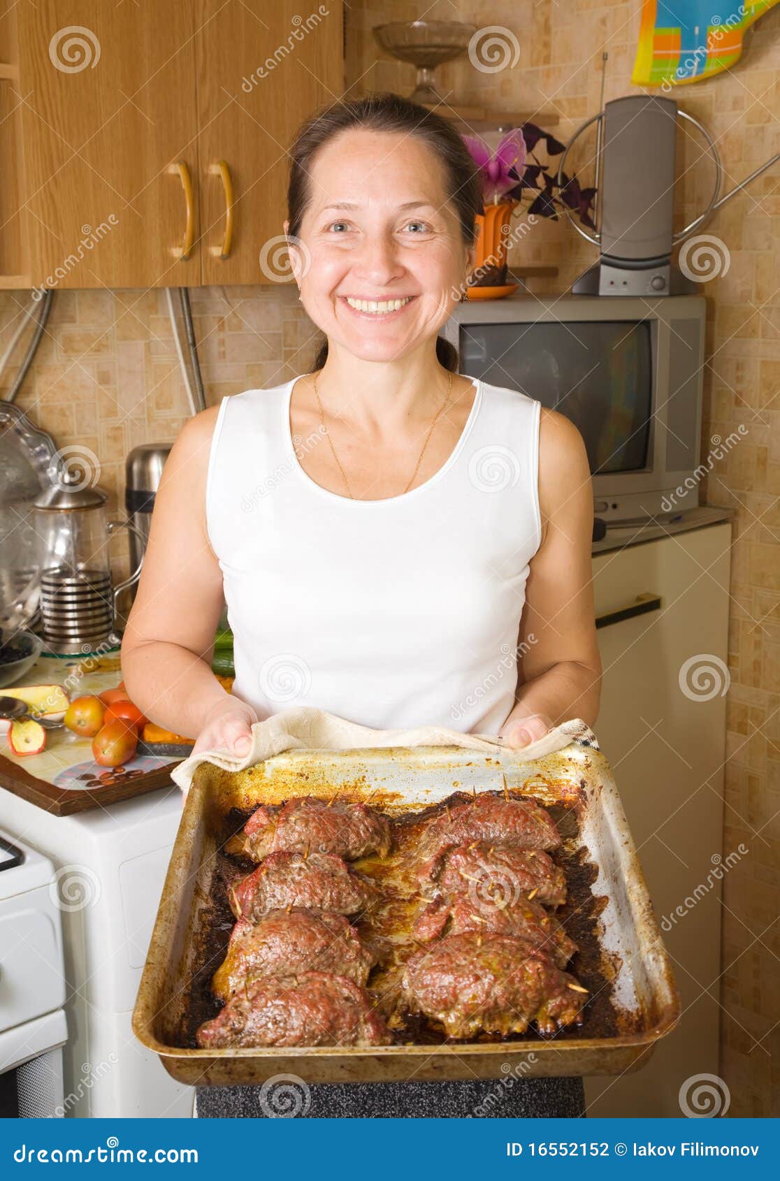 Woman with Cooked Baked Beef Stock Photo - Image of woman, domestic ...