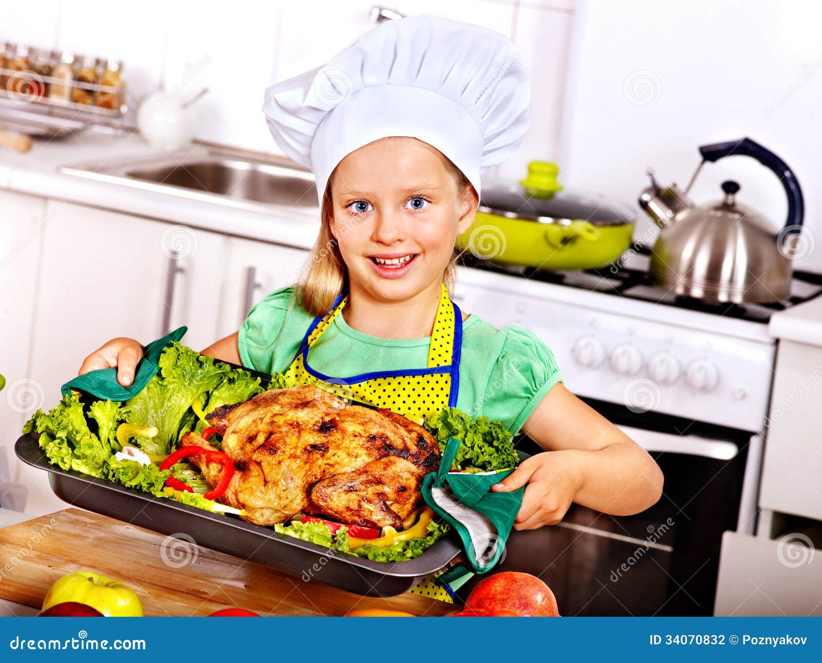 Woman Cooking Chicken at Kitchen. Stock Photo - Image of housework ...