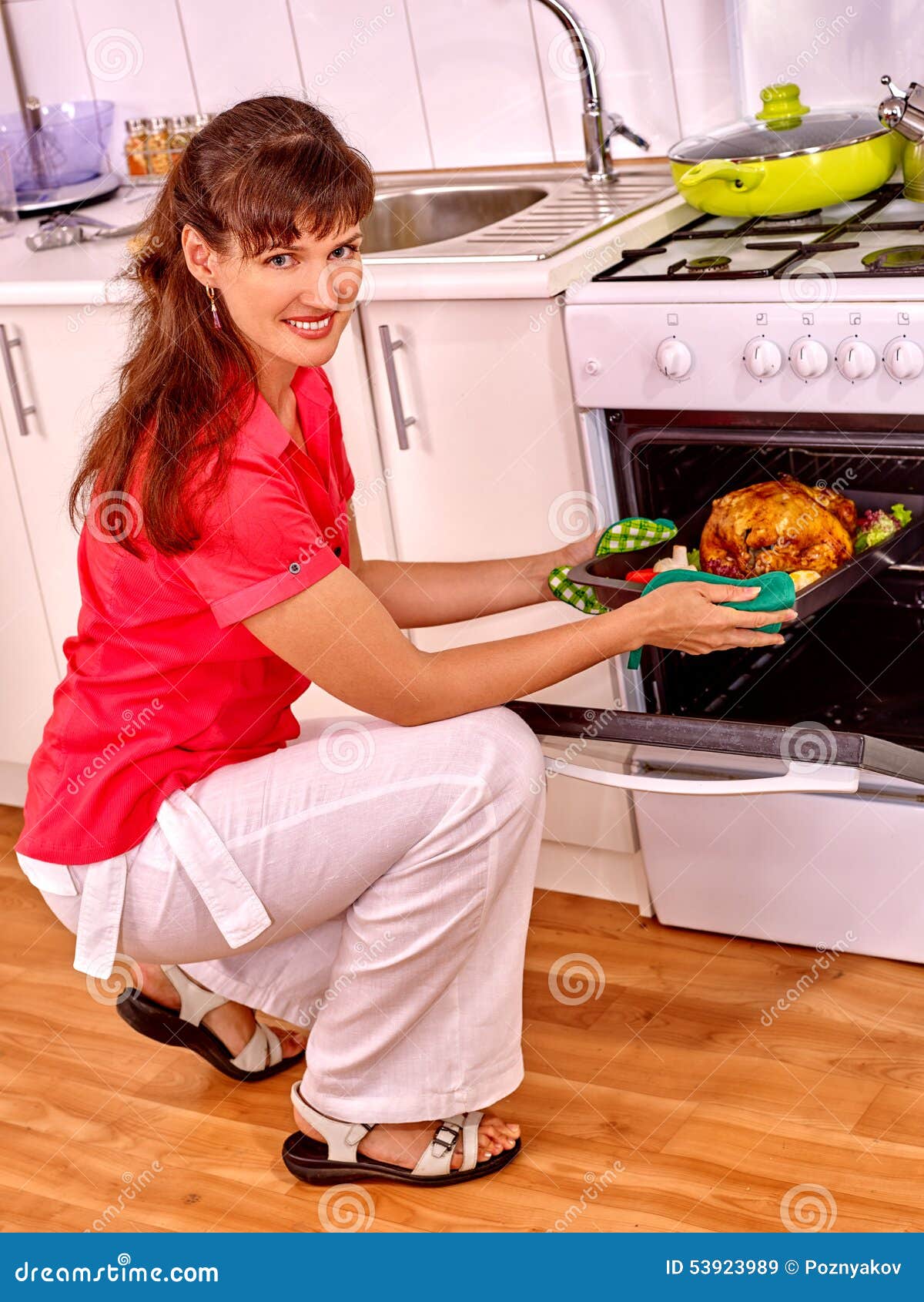 Woman Cooking Chicken at Kitchen Stock Image - Image of grilled, dinner ...