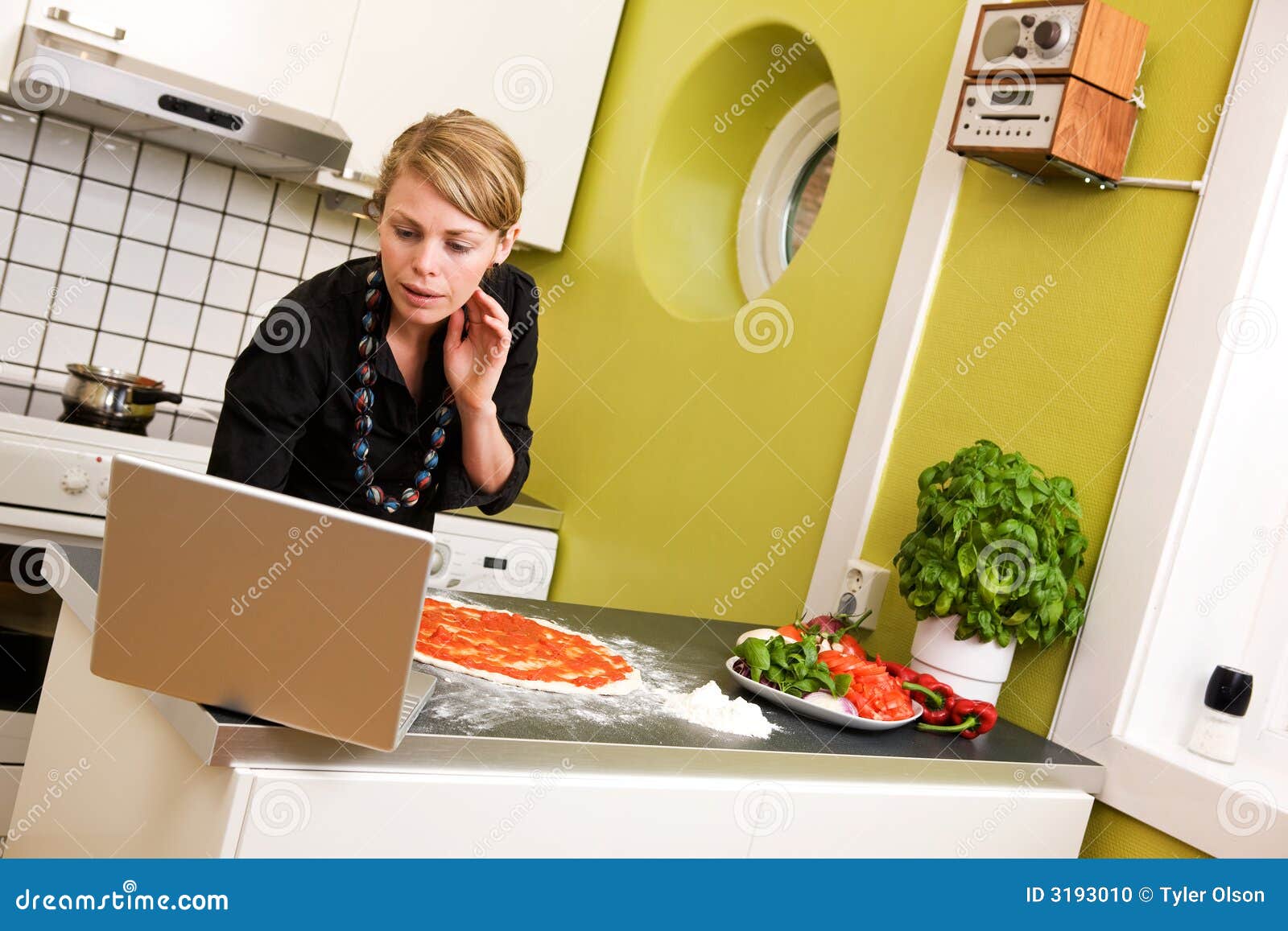 Woman Cooking with Computer Stock Photo - Image of homemade, home: 3193010