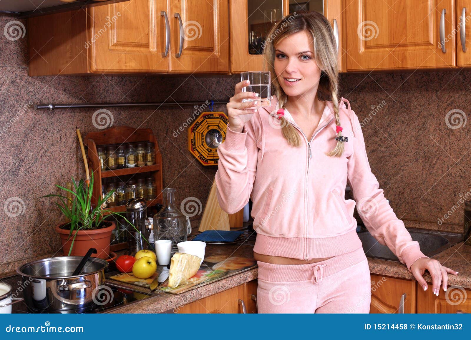 Woman cooking dinner stock photo. Image of optimistic - 15214458