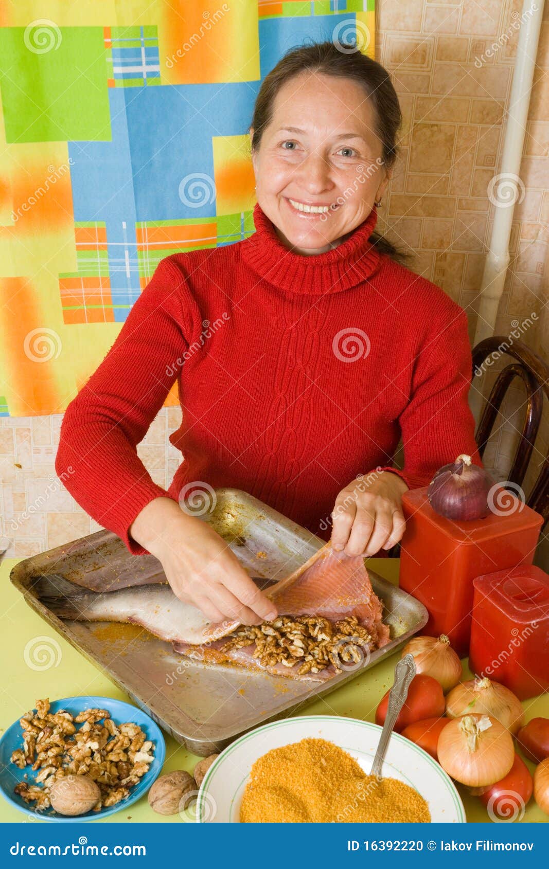 Woman is cooking fish stock photo. Image of fish, female - 16392220