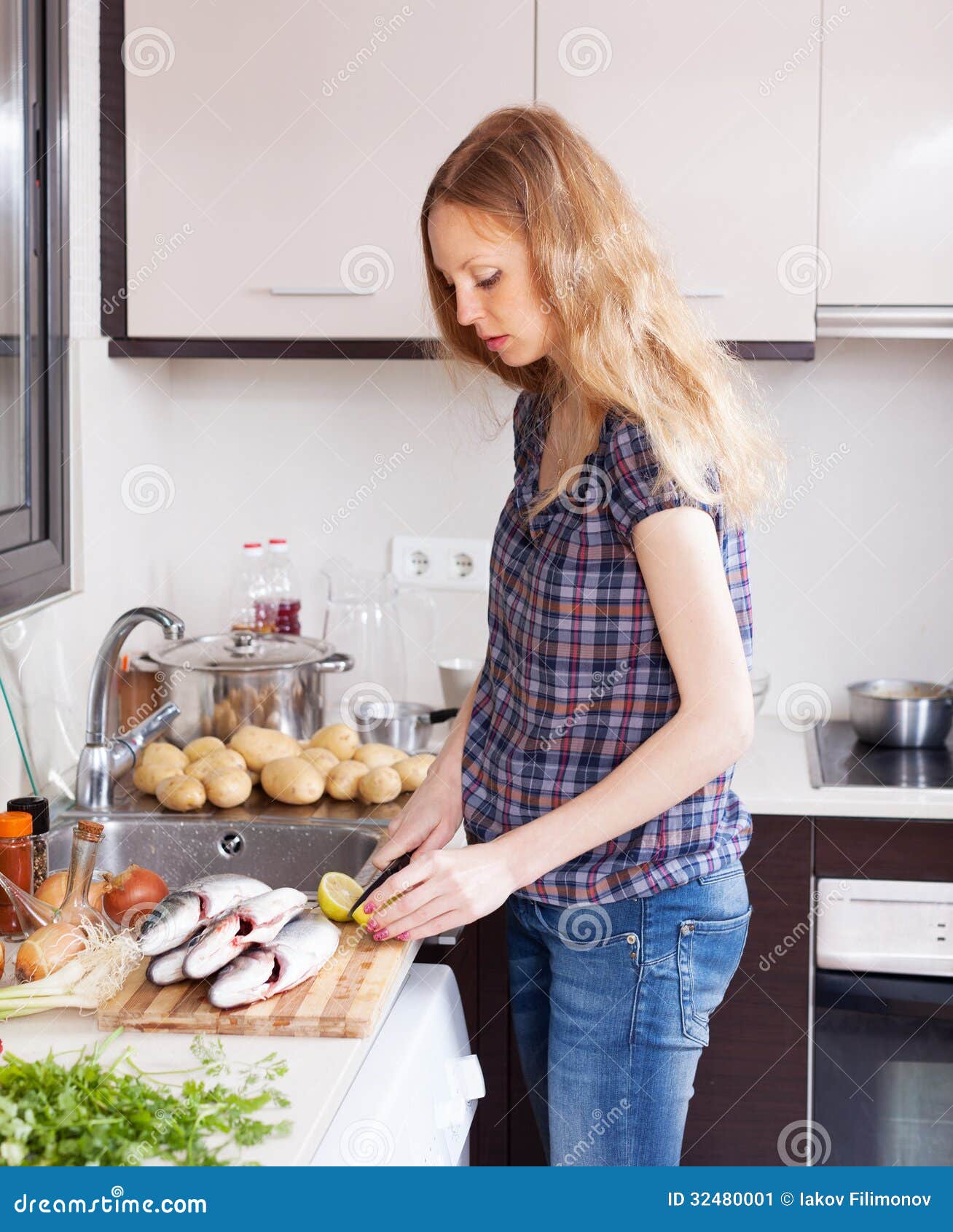 Woman cooking fish stock image. Image of interior, tasty - 32480001