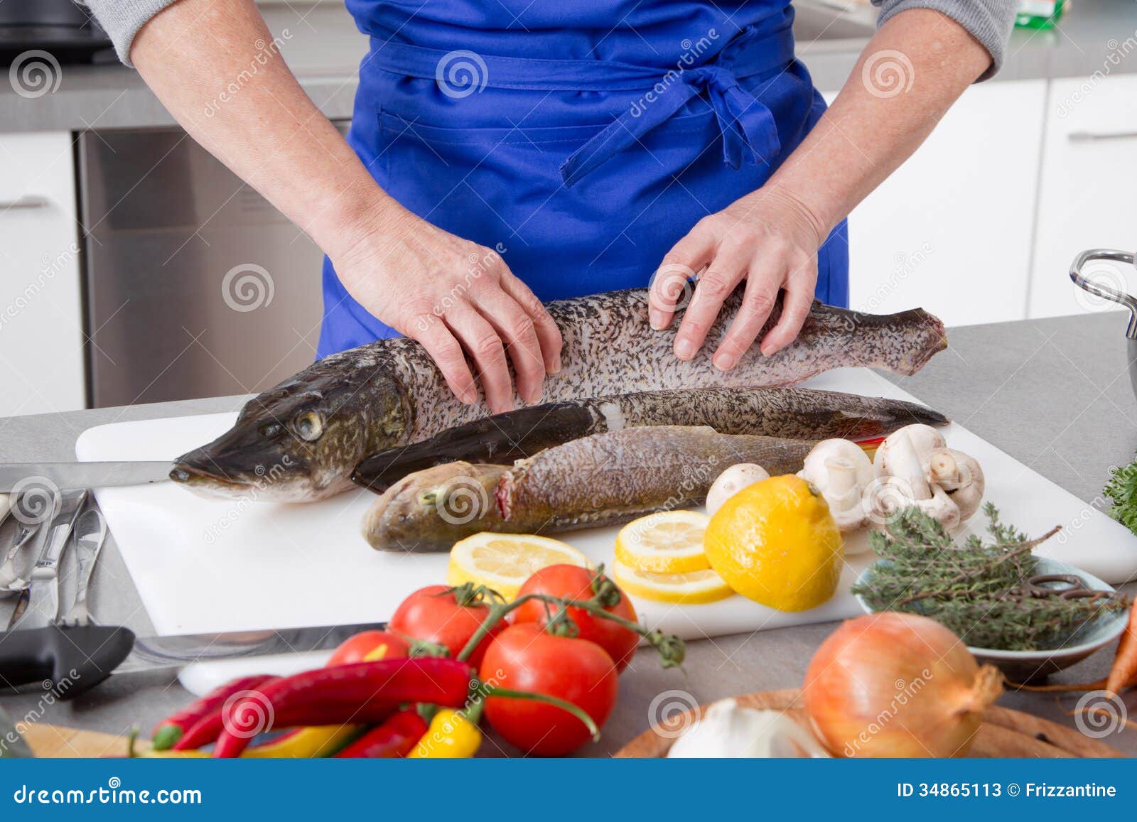 Woman is Cooking Fresh Fish Stock Image - Image of hobby, cooking: 34865113