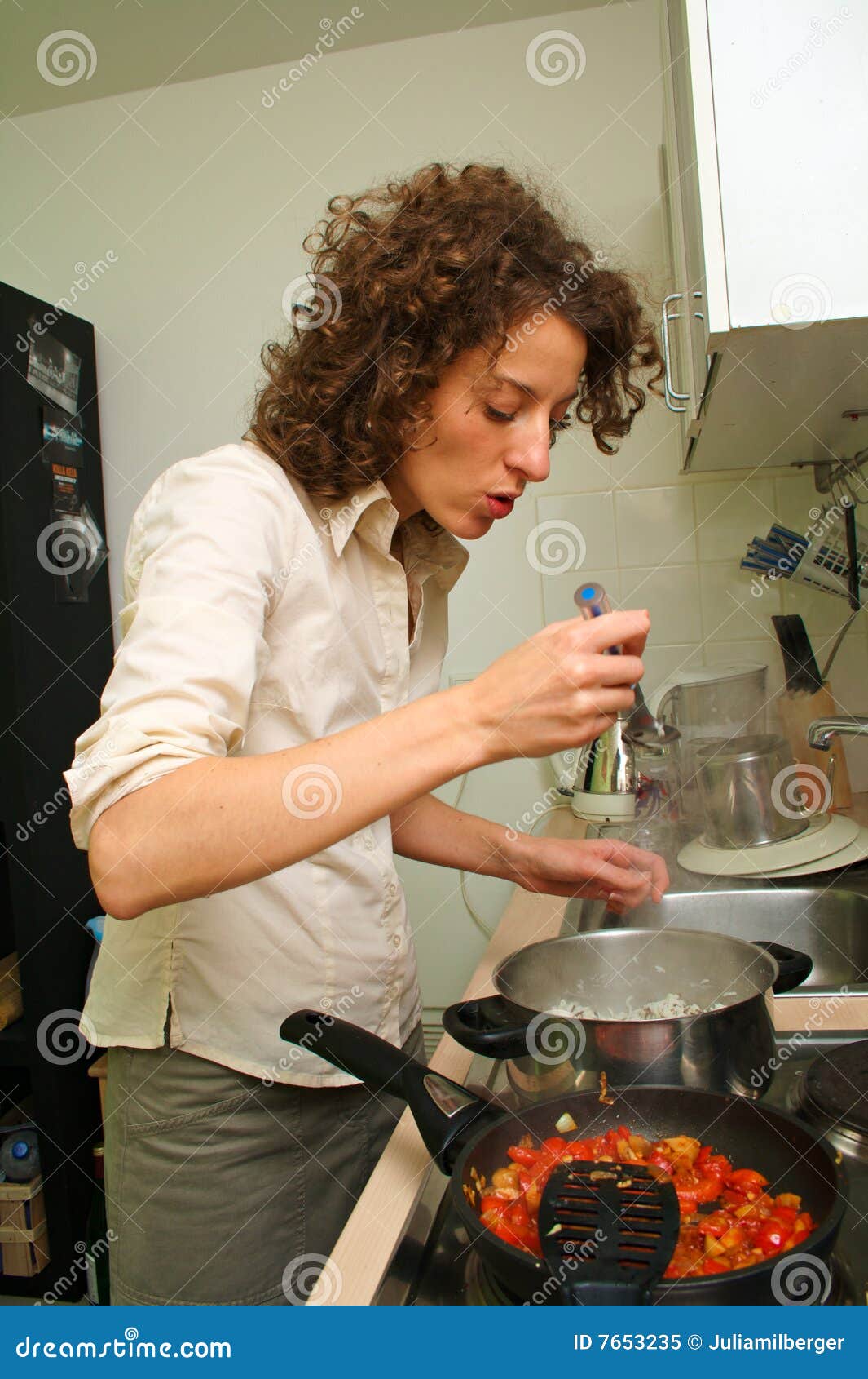 Woman cooking at home stock image. Image of color, preparations - 7653235