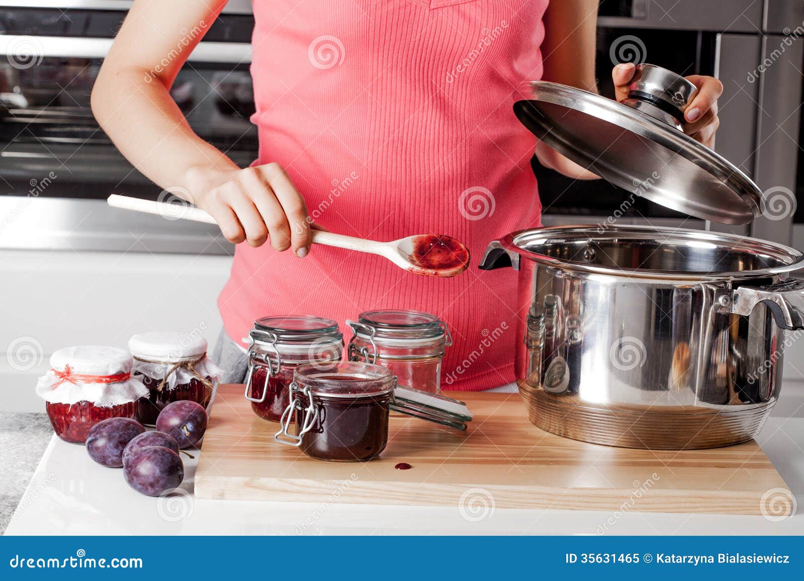 Woman cooking a jam stock image. Image of hand, kitchen - 35631465