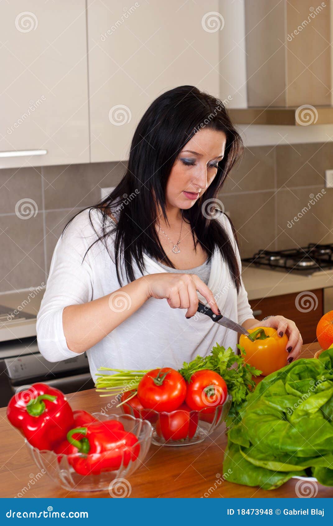Woman cooking in kitchen stock photo. Image of kitchen - 18473948