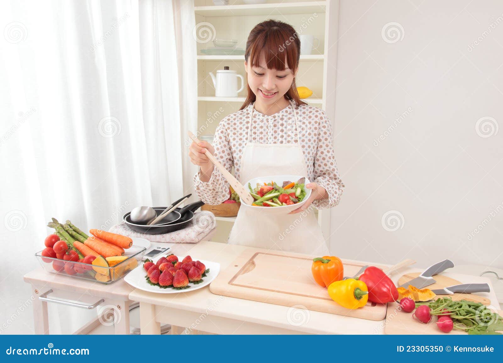 Woman cooking in kitchen stock photo. Image of interior - 23305350
