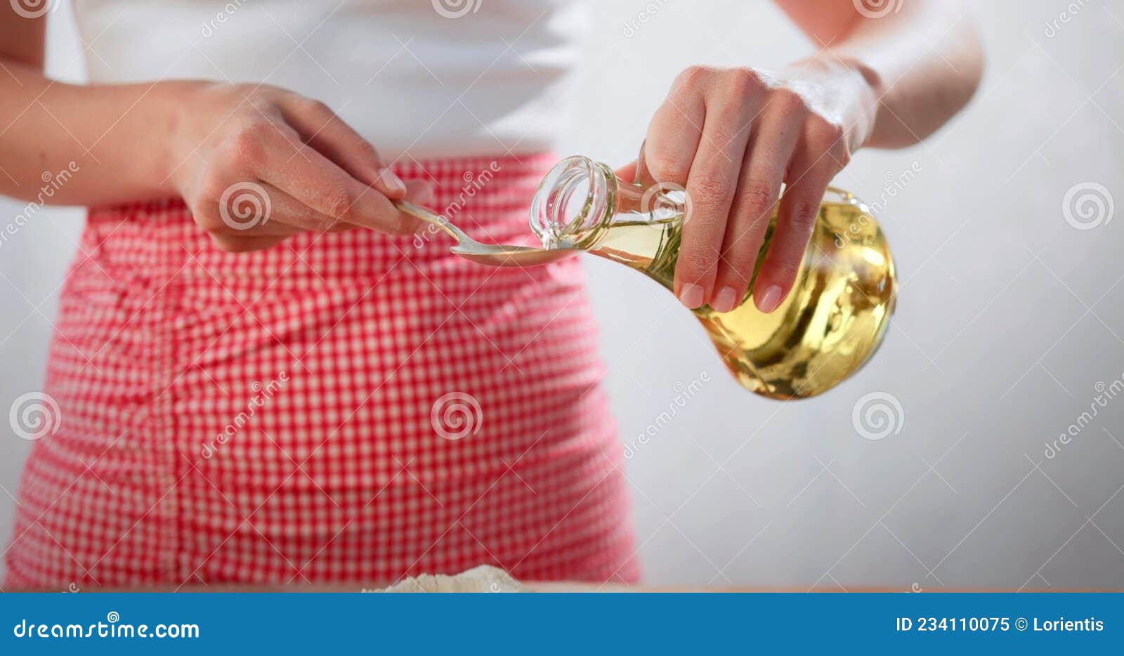 A Woman is Cooking with Oil Stock Image - Image of chef, closeup: 234110075