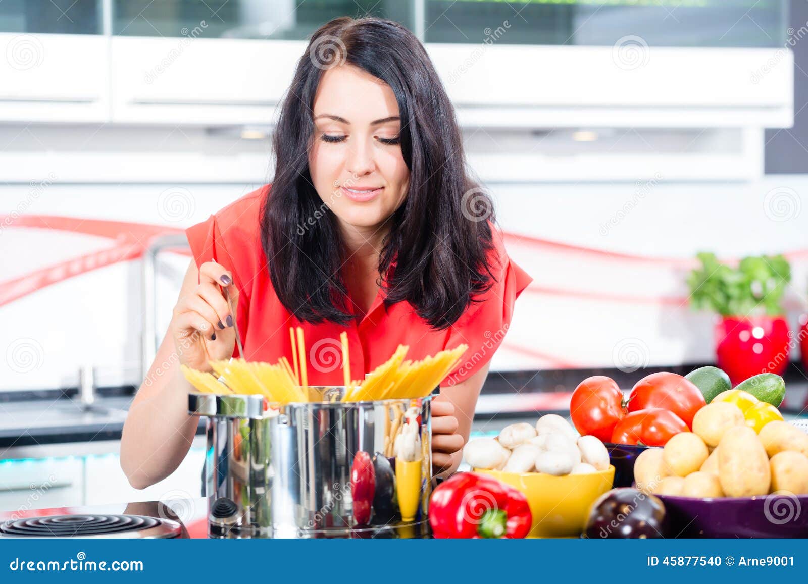 Woman Cooking Pasta in Kitchen Stock Photo - Image of beautiful ...