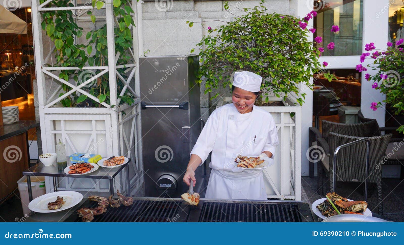 A Woman Cooking at the Restaurant in Singapore Editorial Image - Image ...