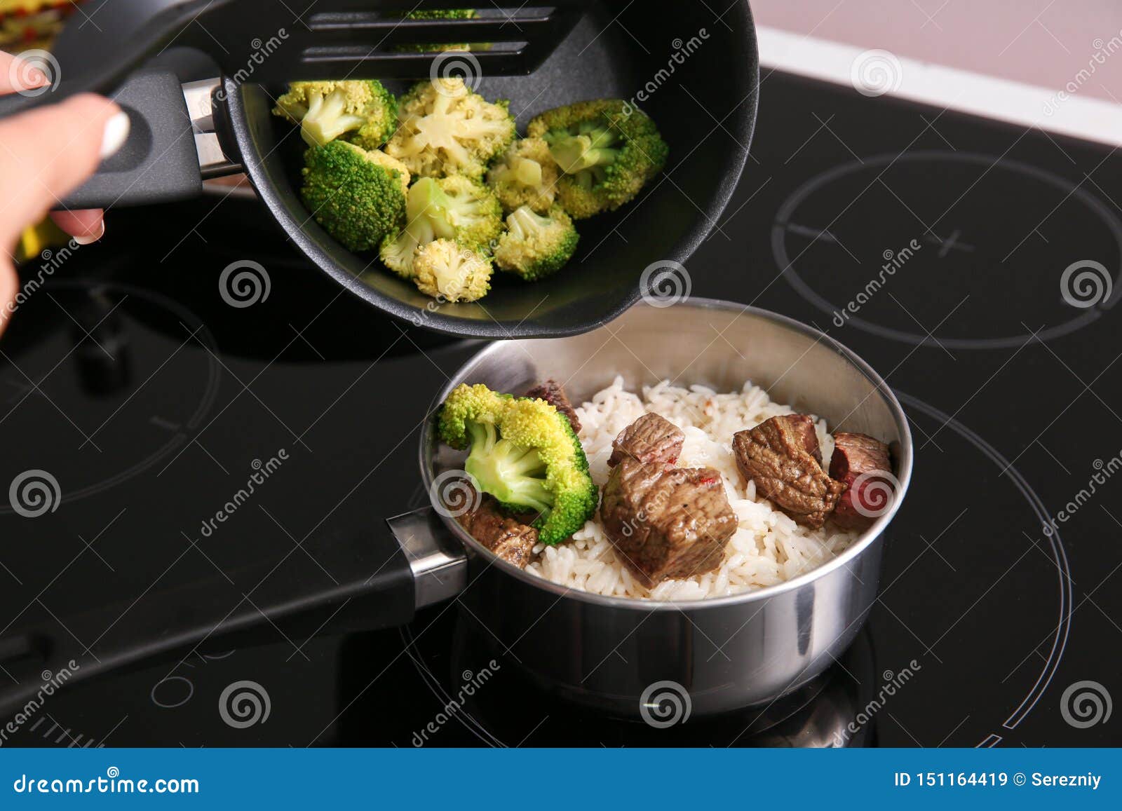 Woman Cooking Rice with Meat and Broccoli in Kitchen Stock Image ...
