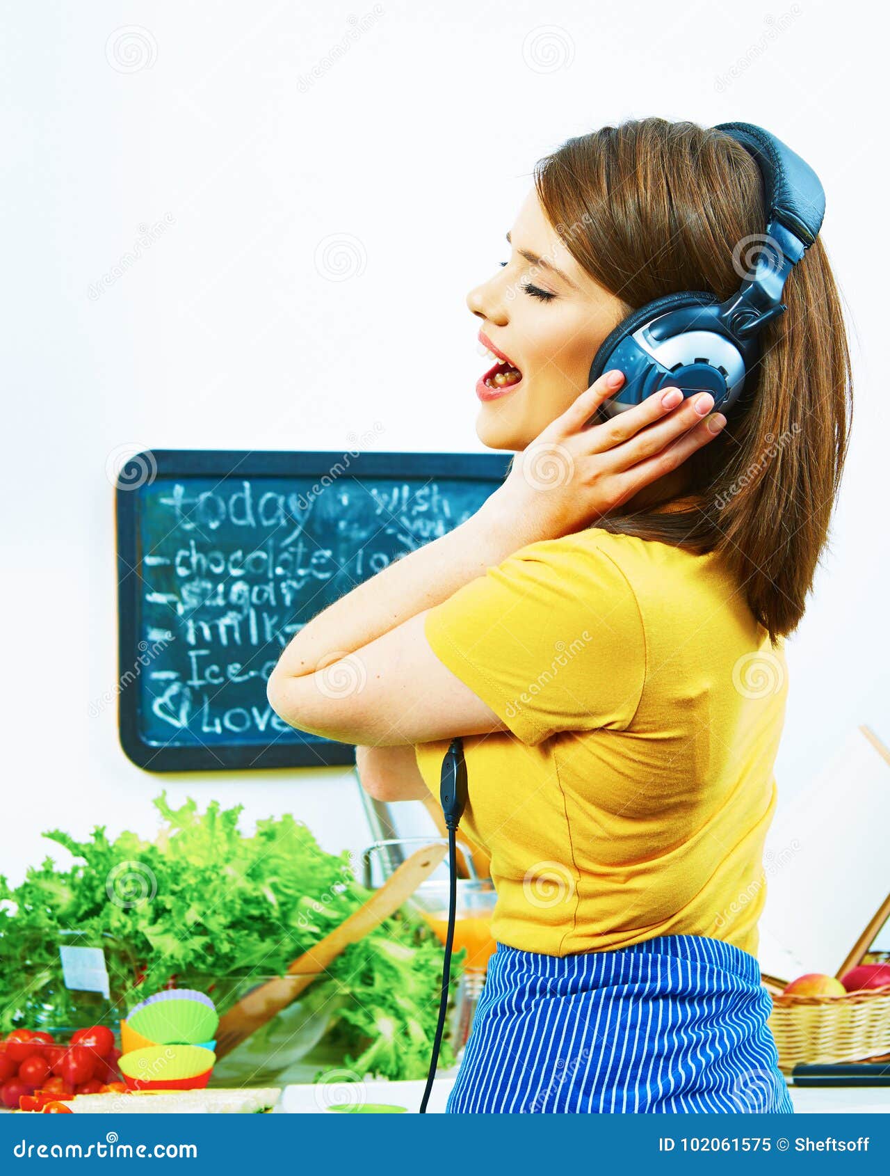 Woman Cooking with Singing. Stock Image - Image of board, female: 102061575