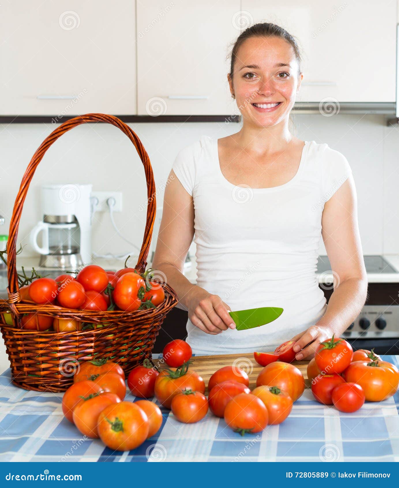 Woman cooking tomatoes stock image. Image of caucasian - 72805889