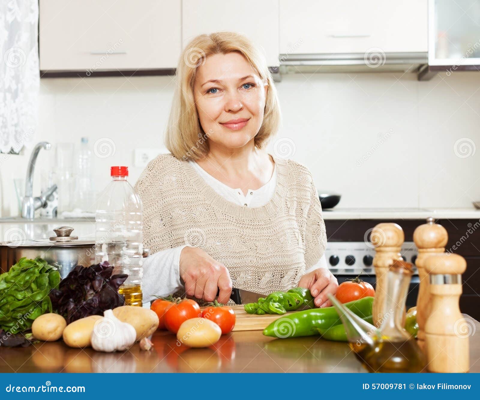 Woman Cooking Vegetables in Kitchen Stock Image - Image of cook, knife ...