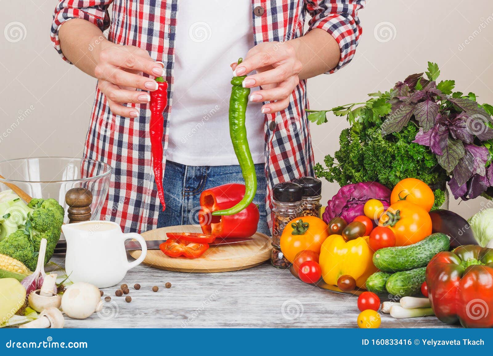 Woman Cooks at the Kitchen, Body Part, Blurred Background Stock Photo ...