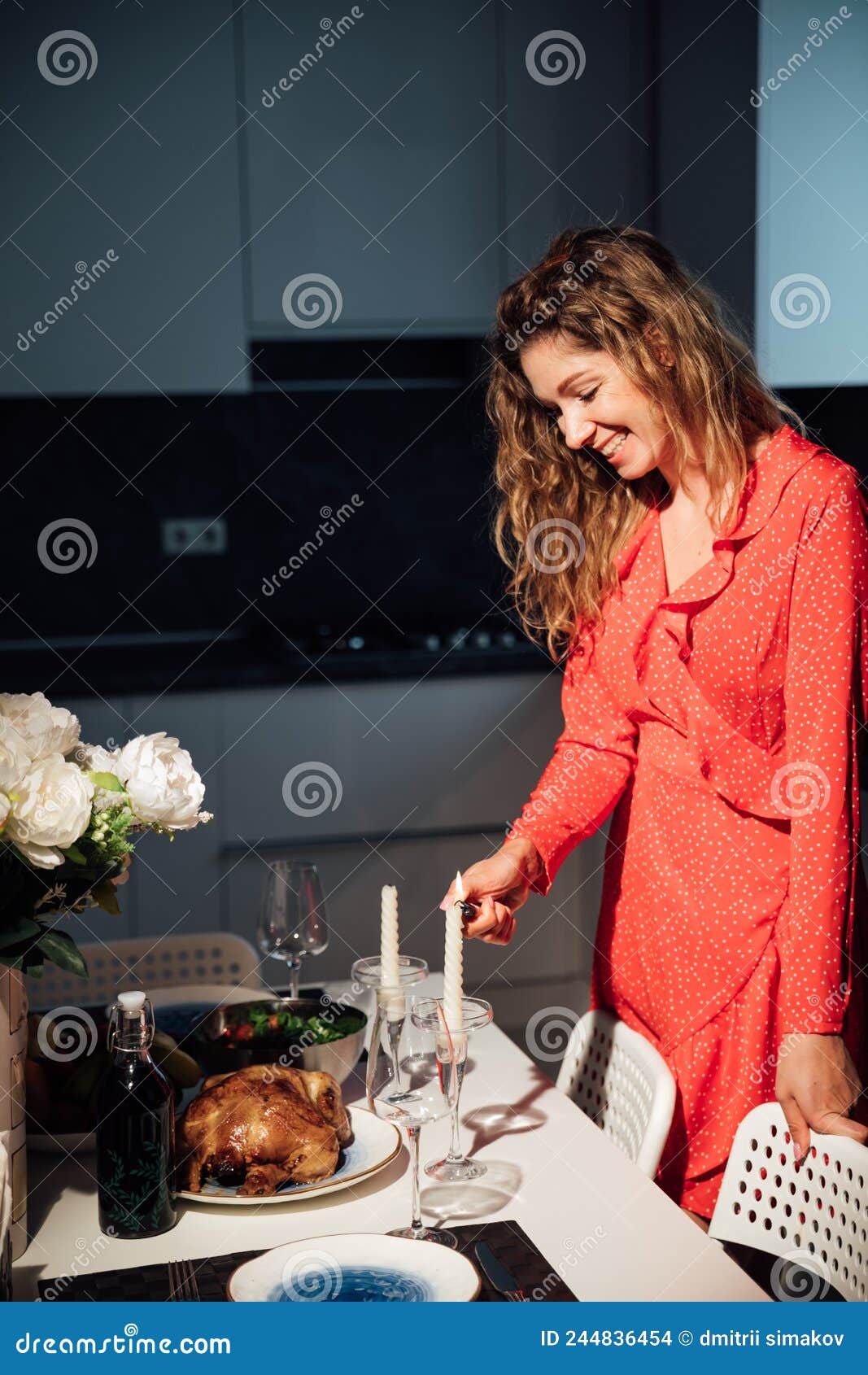 Beautiful Woman Cooks a Romantic Dinner in the Kitchen Stock Photo ...