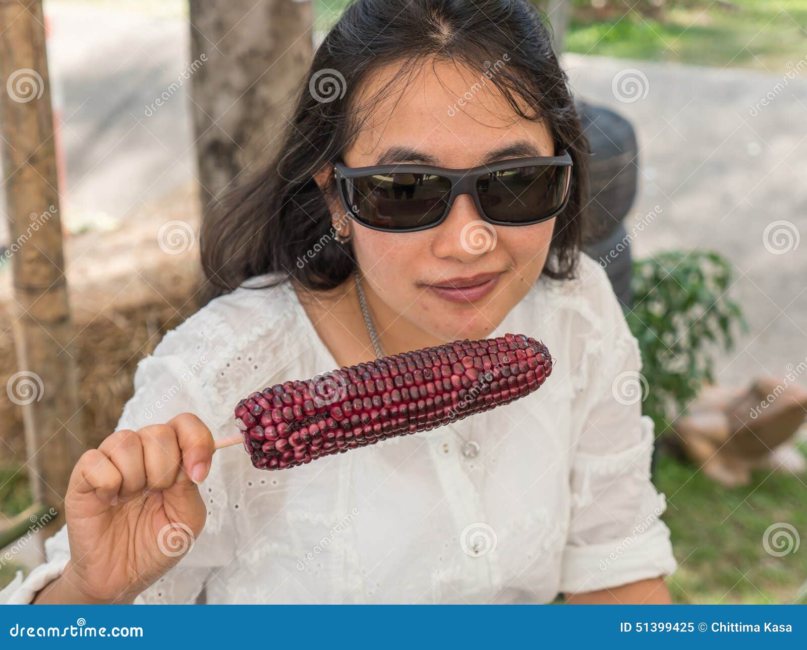 Woman and corn stock image. Image of organic, outdoors - 51399425