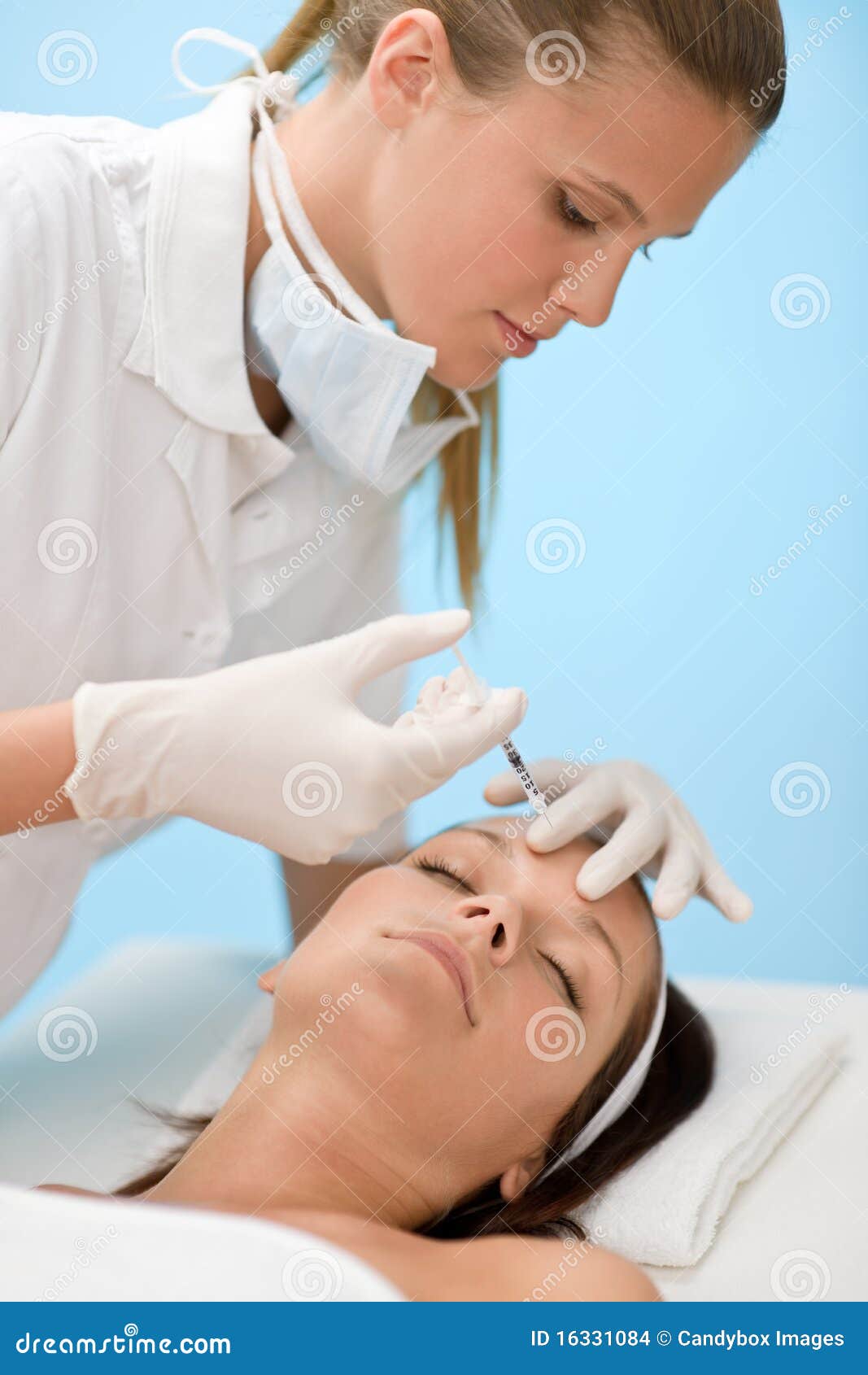 Woman in Cosmetic Salon Getting Treatment Stock Photo - Image of latex ...