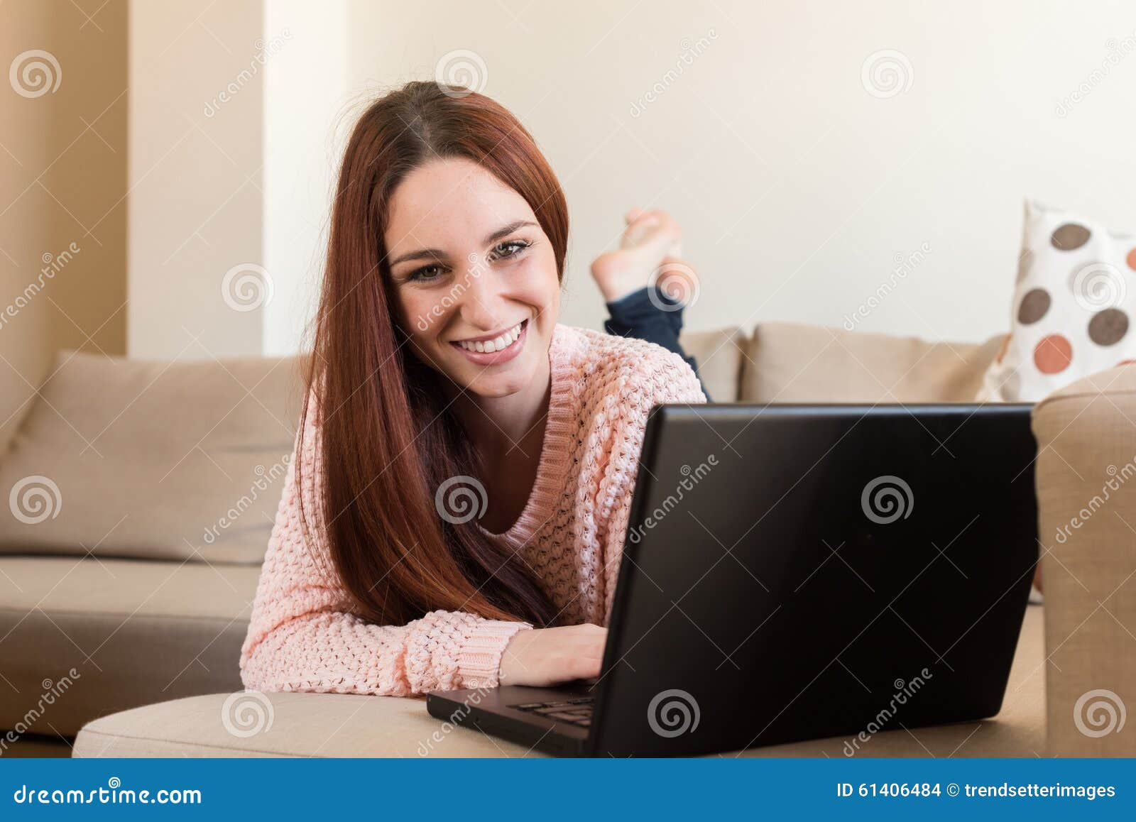 Woman on couch with laptop stock photo. Image of pretty - 61406484