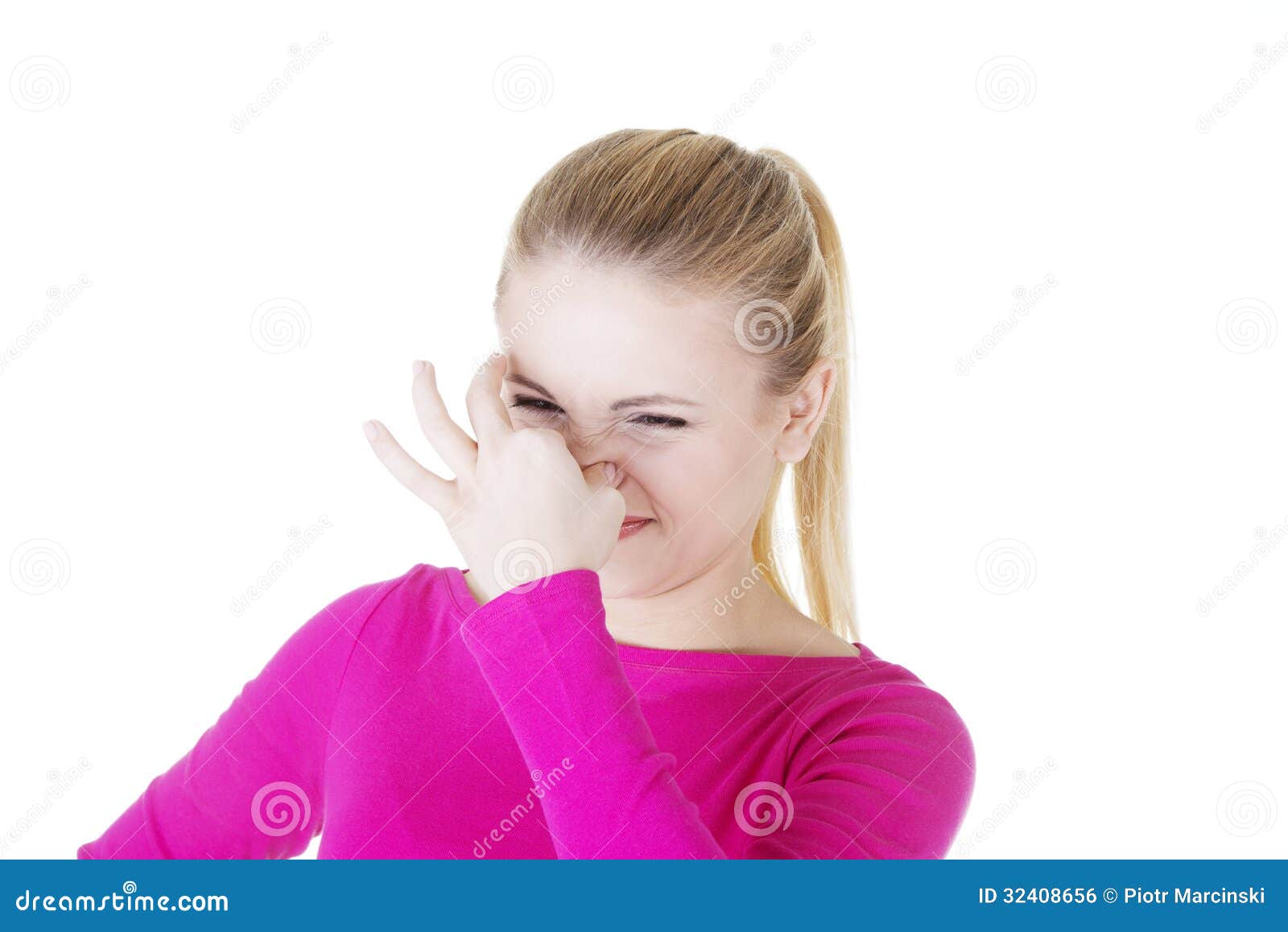 Woman Covers Nose with Hand Showing that Something Stinks Stock Photo ...