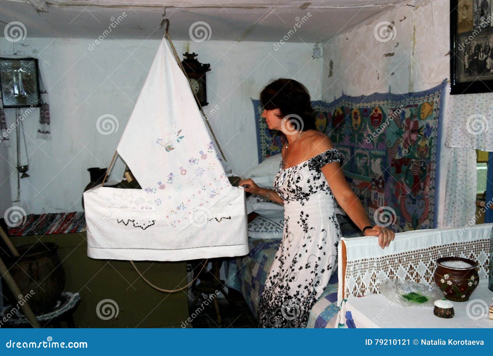 The woman at the cradle stock image. Image of decoration - 79210121