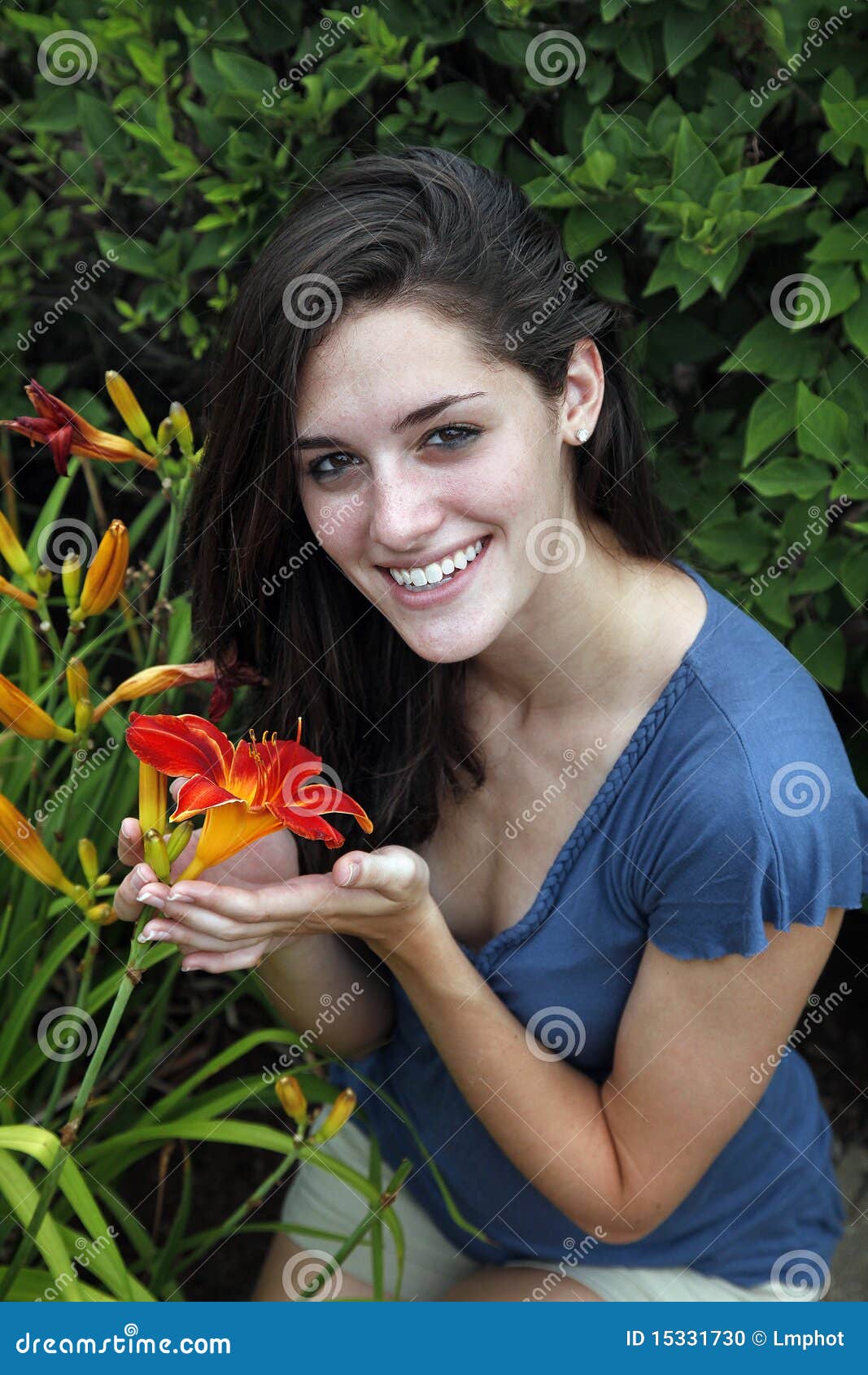 Woman cradling flower stock photo. Image of caucasian - 15331730
