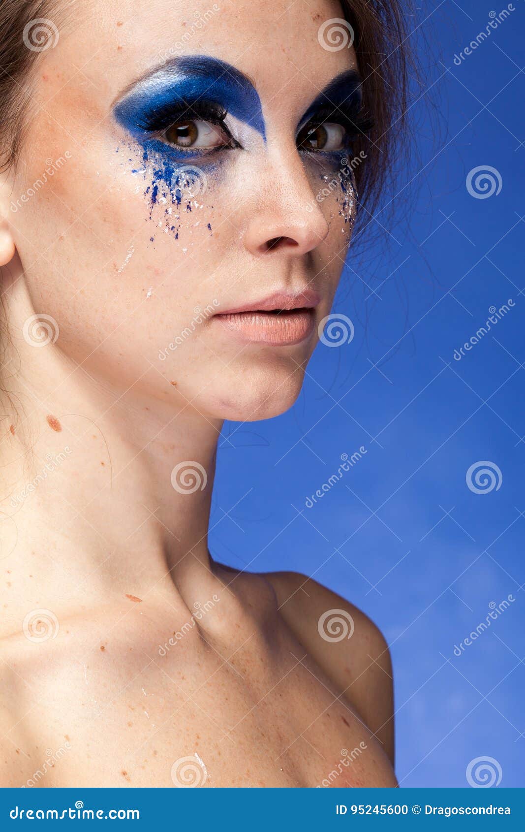 Woman with Creative Make Up on Blue Background Stock Photo - Image of ...