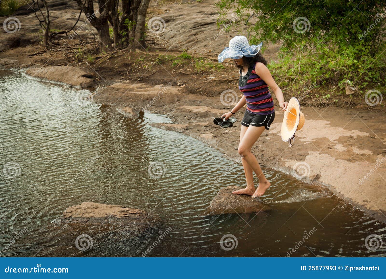 Woman crossing river stock image. Image of stepping, walking - 25877993